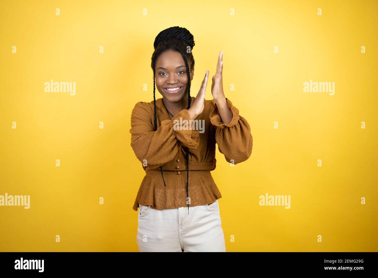 Woman applaud happy gesture applause hi-res stock photography and ...