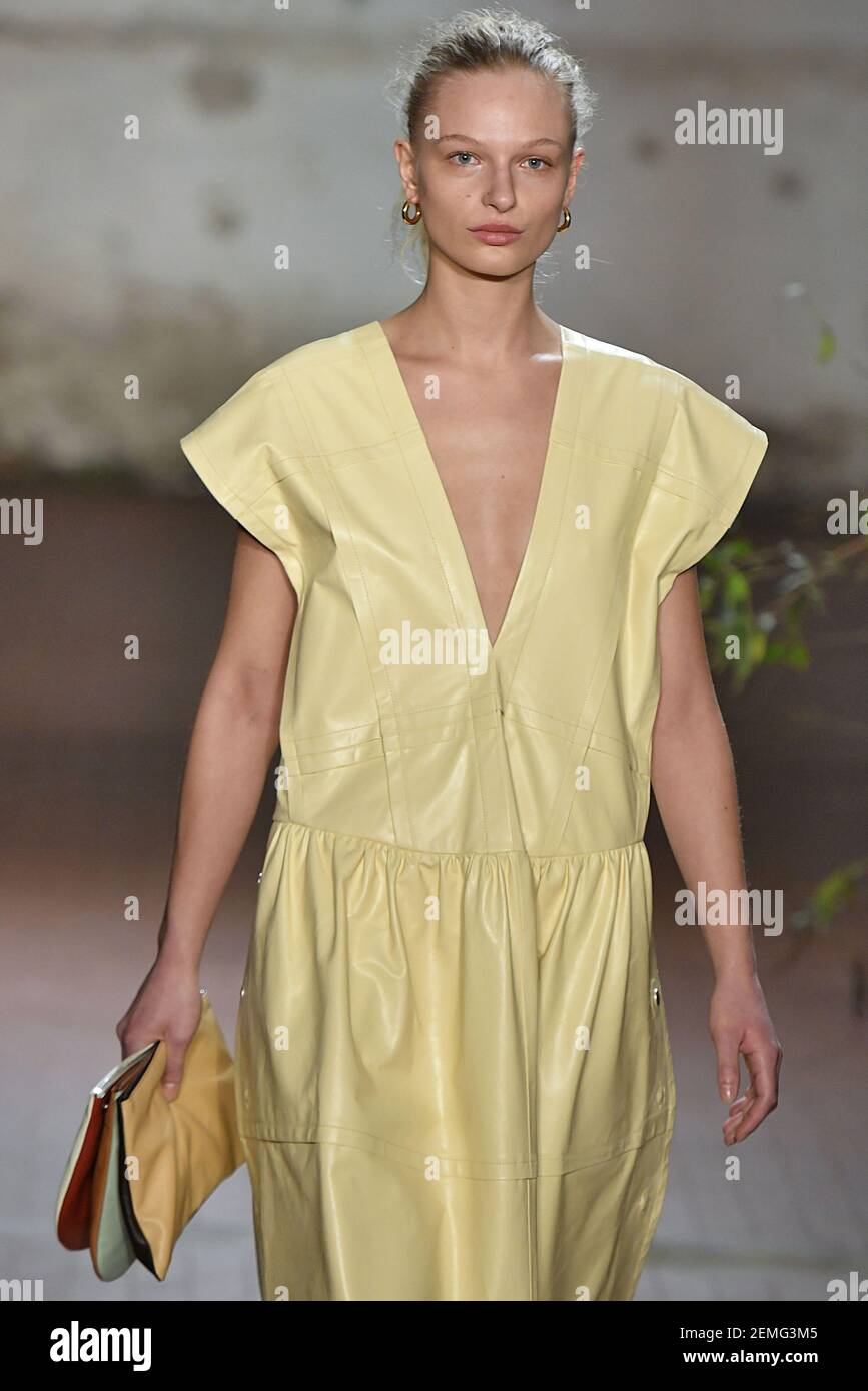 Model walks on the runway during the Jil Sander Fashion Show at Milan ...