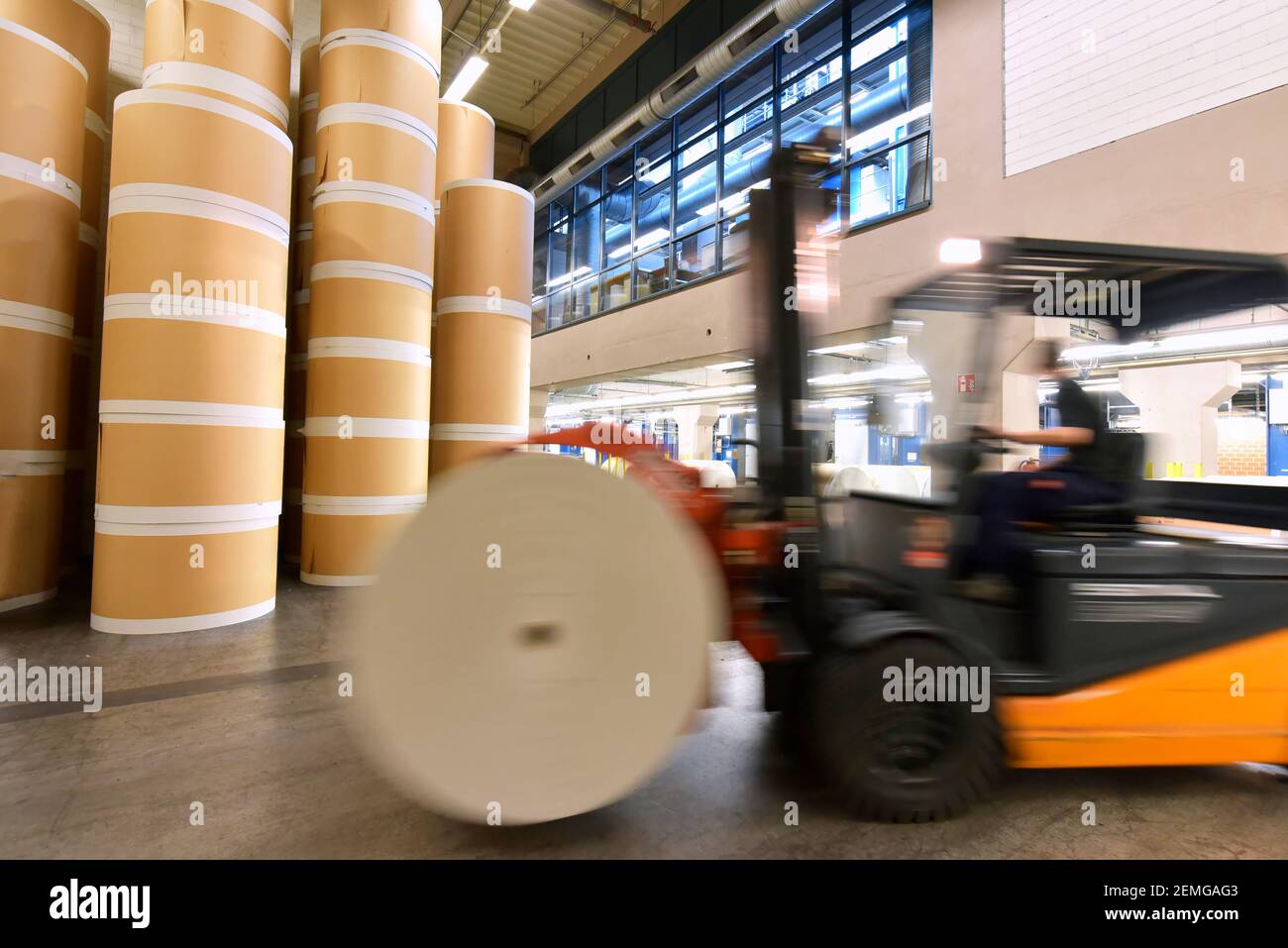 Storage of paper rolls in a large print shop - transport with a ...