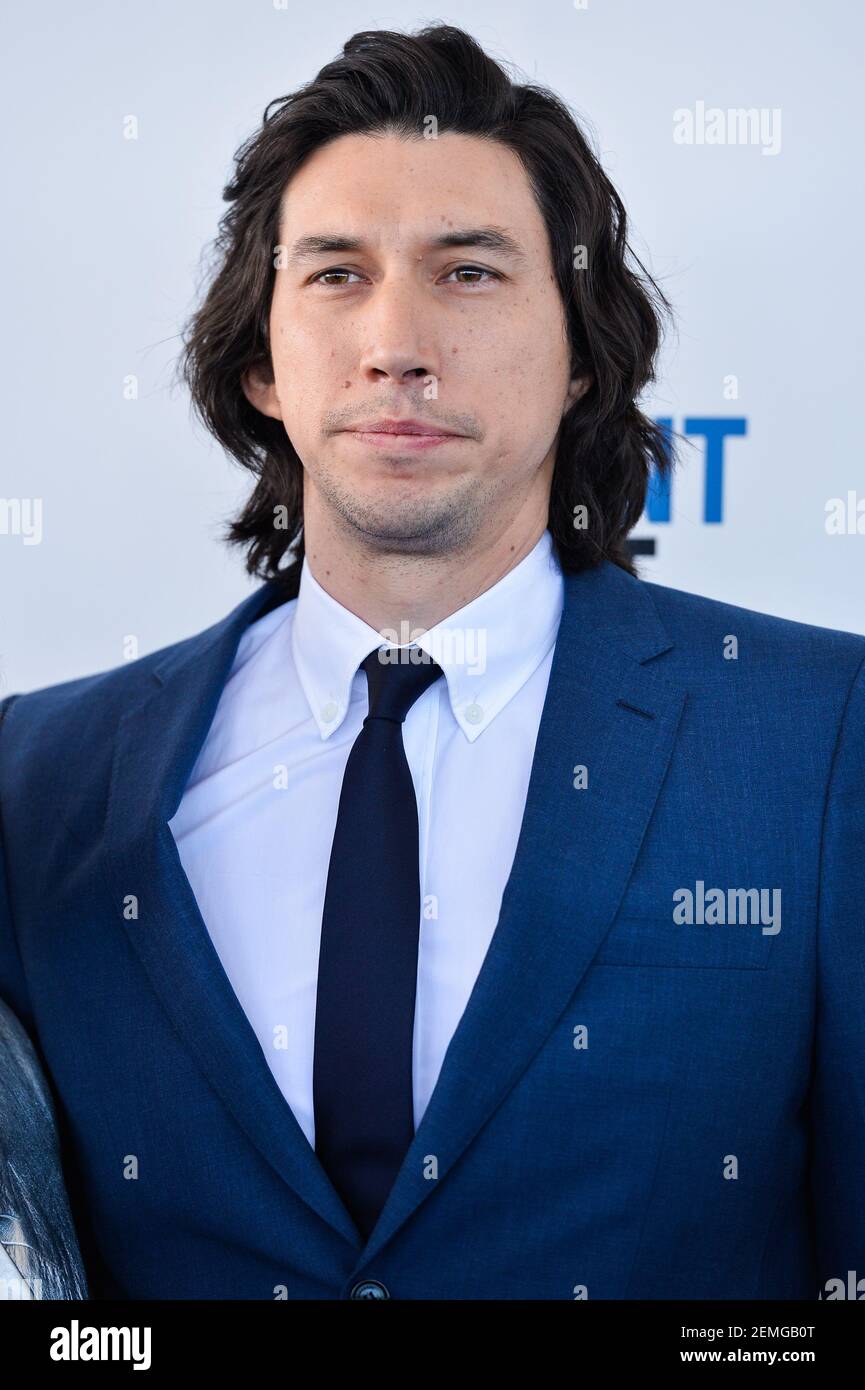 Adam Driver walking on the red carpet at the 34th Film Independent ...