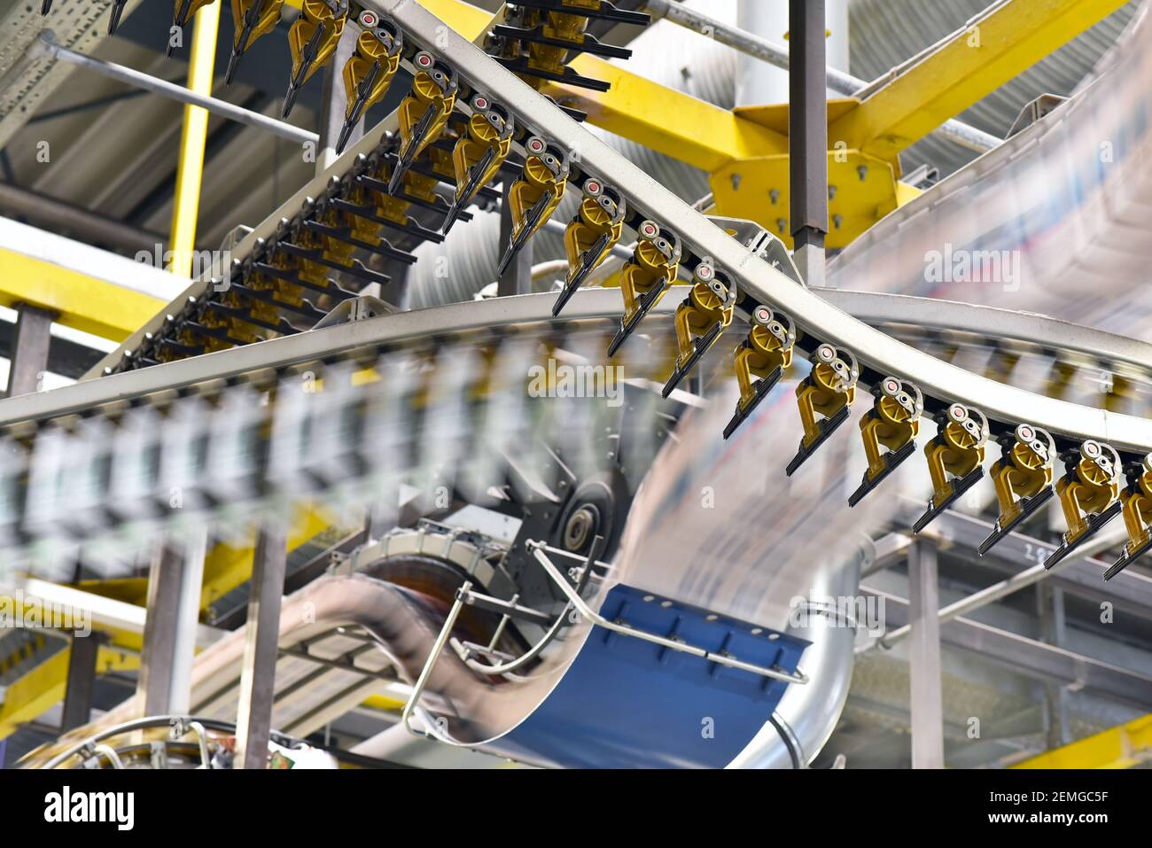 modern machines for transportation in a large print shop for production ...