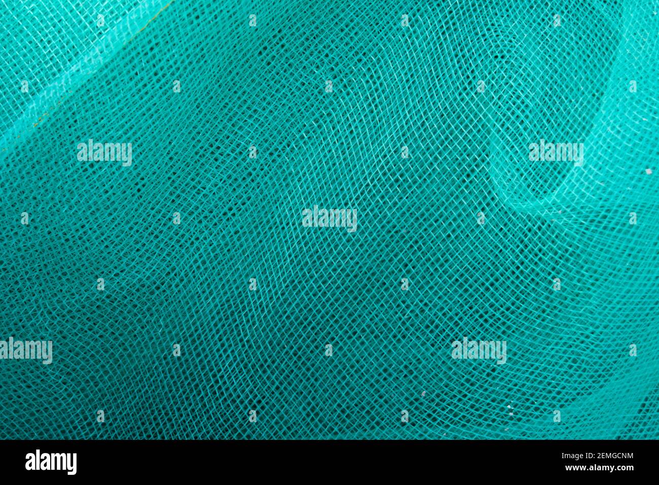 Green mesh. Green textile background Stock Photo - Alamy
