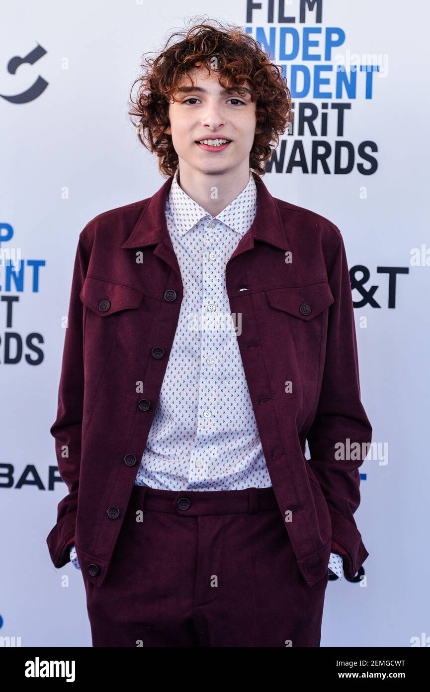 Finn Wolfhard walking on the red carpet at the 34th Film Independent ...