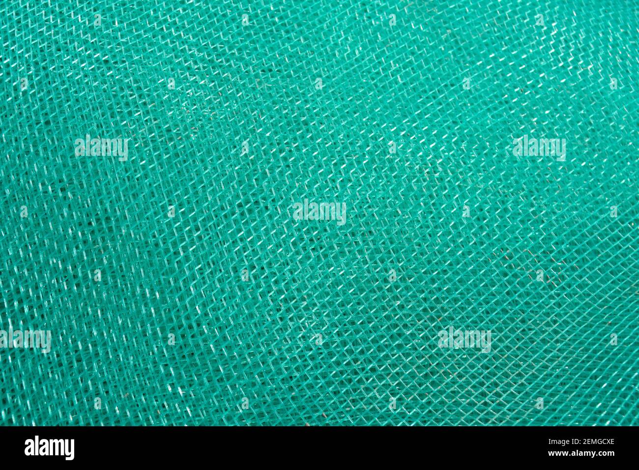 Green mesh. Green textile background Stock Photo - Alamy