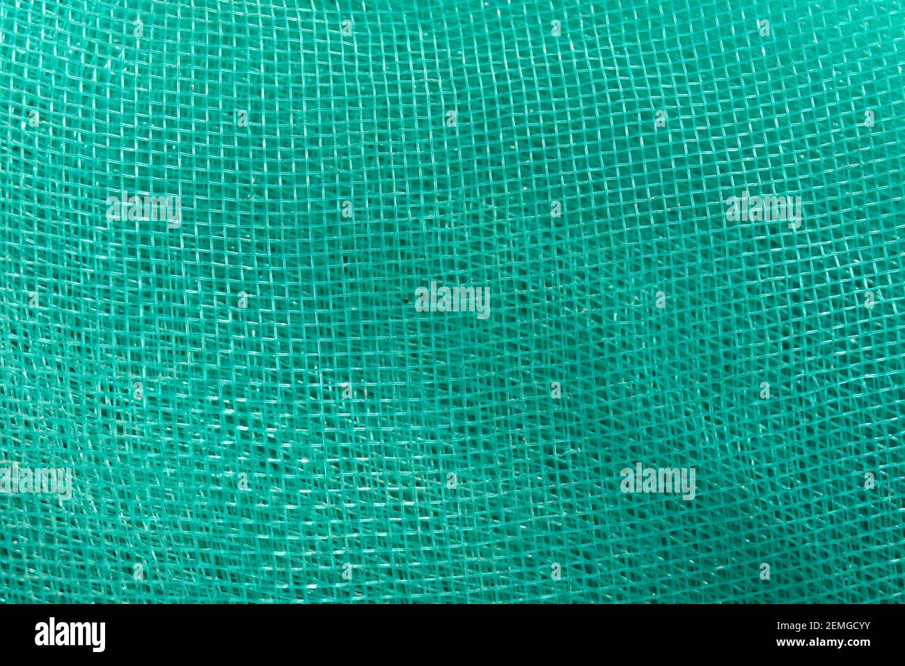 Green mesh. Green textile background Stock Photo - Alamy