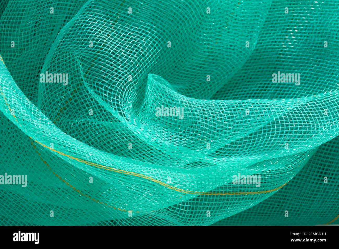Green mesh. Green textile background Stock Photo - Alamy