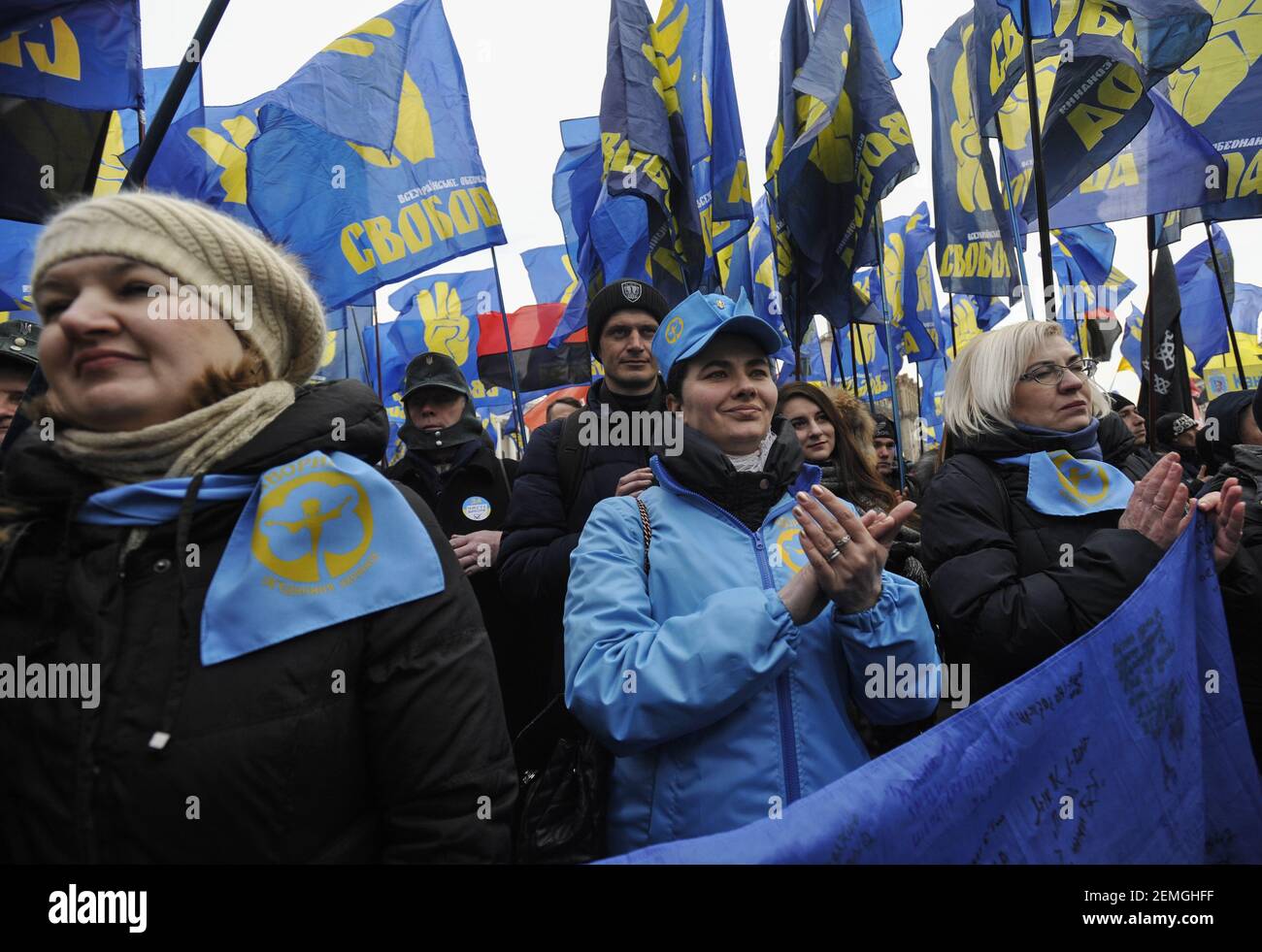 Activists of Ukrainian nationalist parties are seen holding flags ...