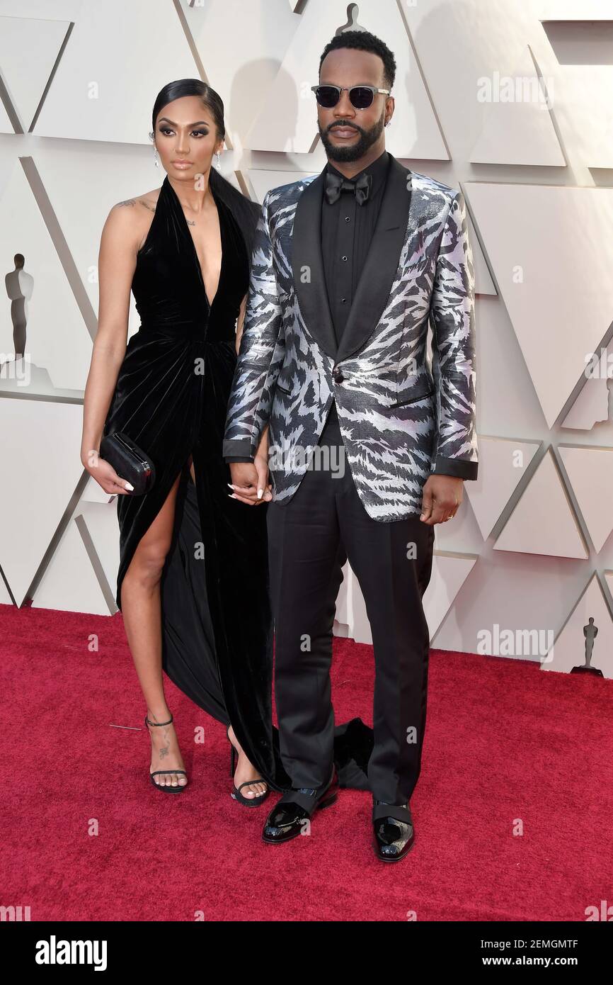 Regina Perera and Juicy J walking on the red carpet at the 91st Academy ...