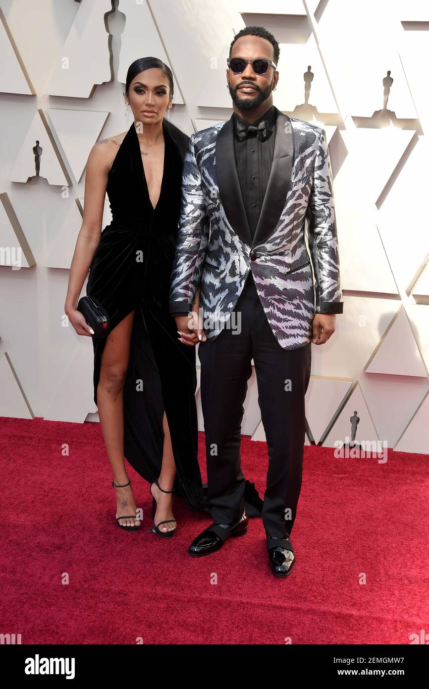 Regina Perera and Juicy J walking on the red carpet at the 91st Academy ...