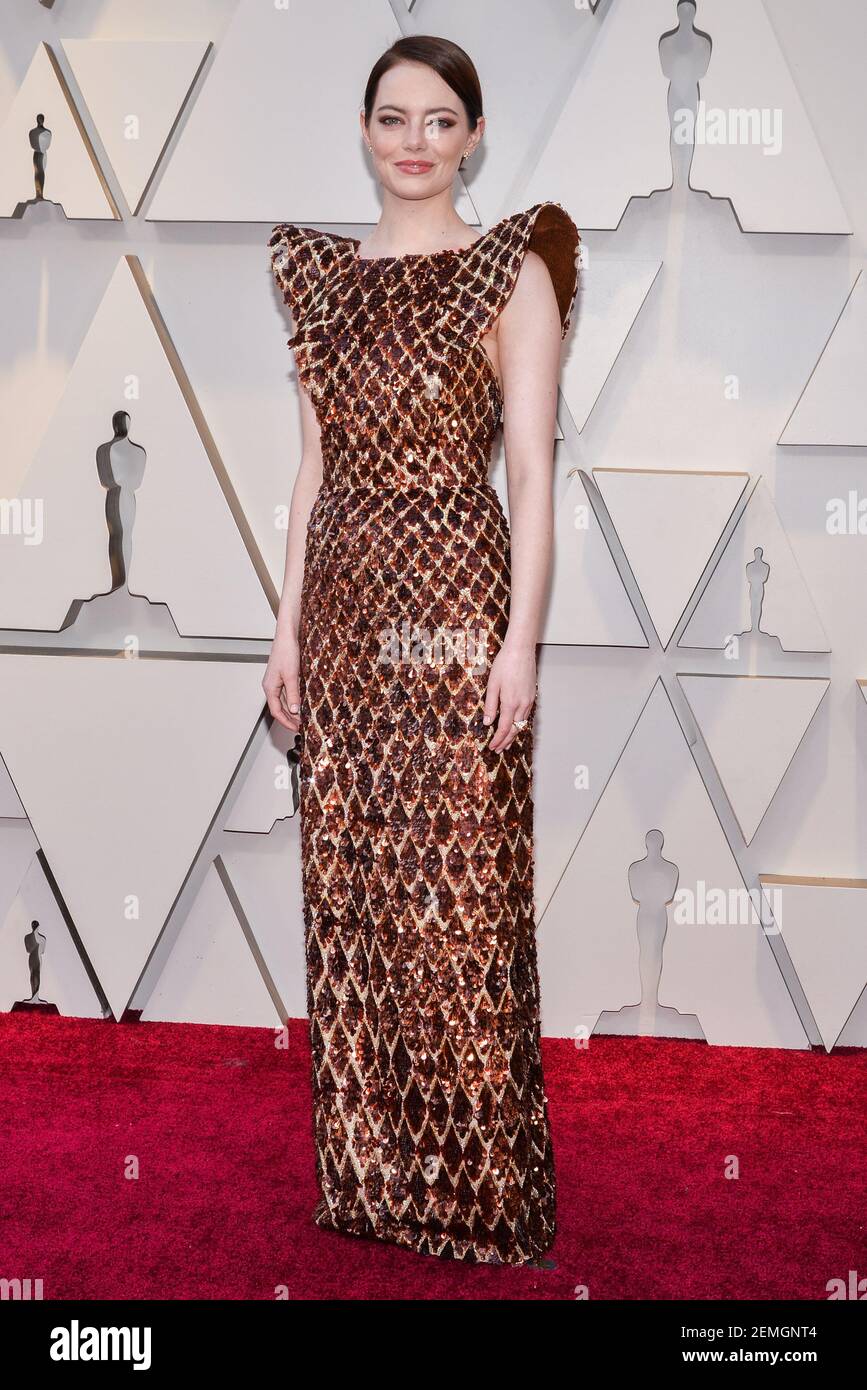 Emma Stone walking on the 2019 Oscars red carpet at the 91st Academy ...
