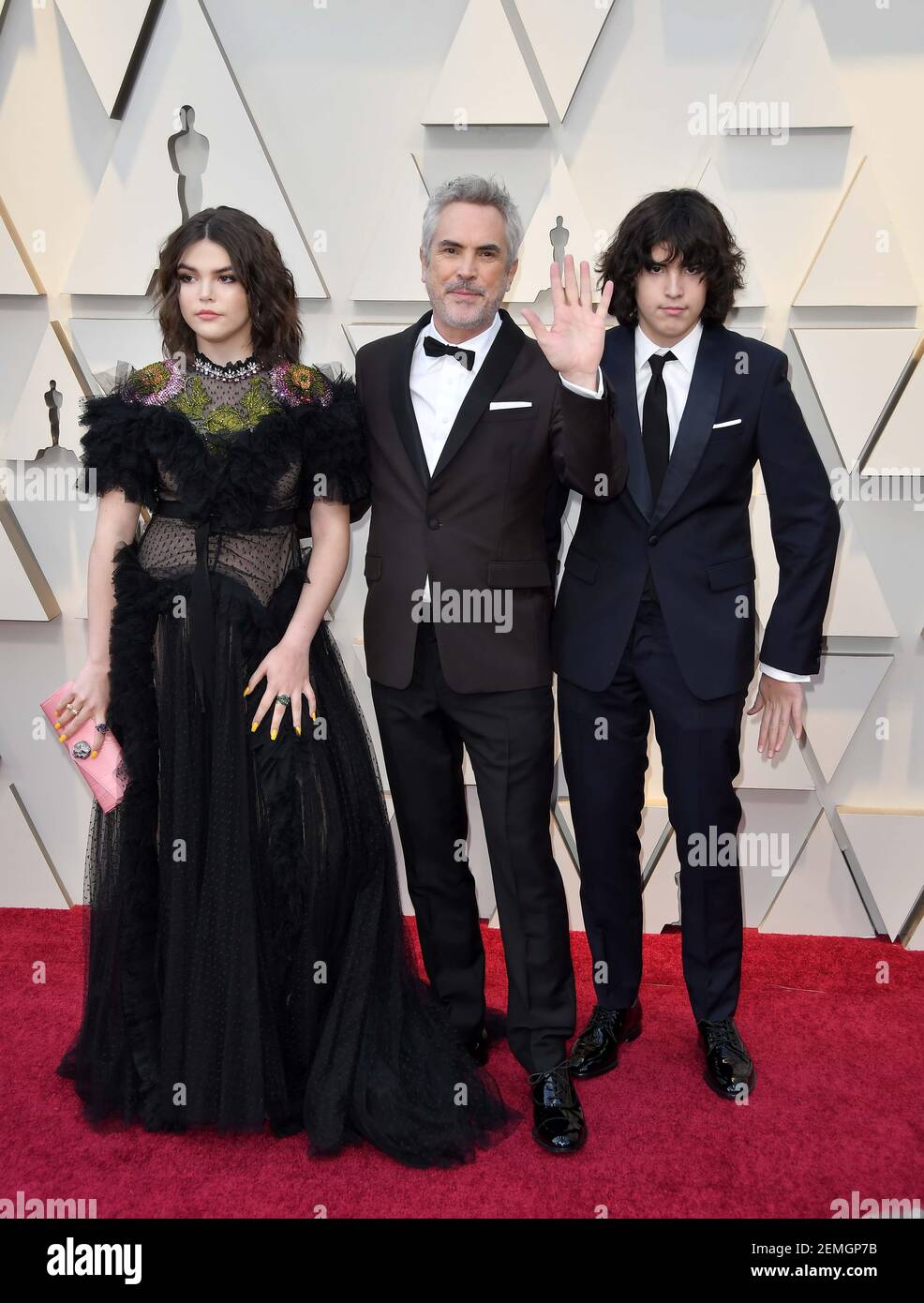 Alfonso Cuaron, daughter Tess Cuaron and son Olmo Cuaron walking on the ...