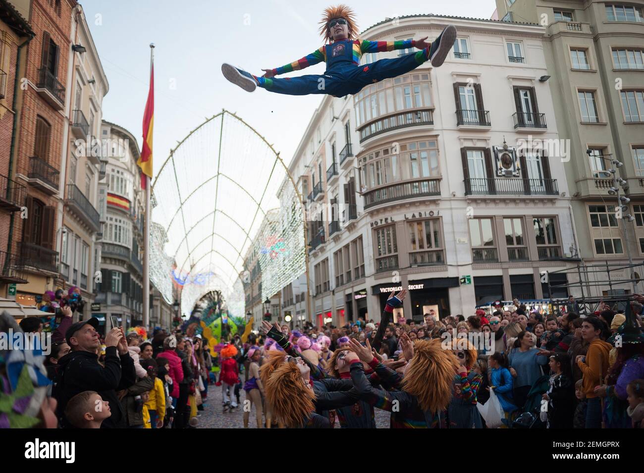 A young performer dressed as the character of the movie "Chucky" is ...