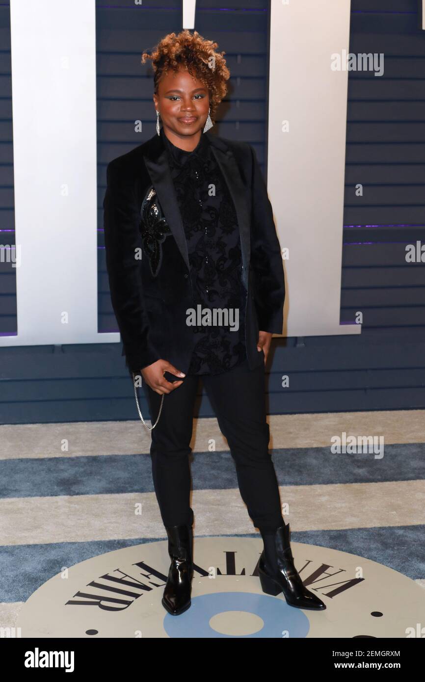 Dee Rees walking on the red carpet at the 2019 Vanity Fair Oscar Party ...