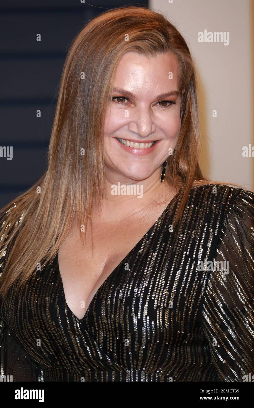 Krista Smith walking on the red carpet at the 2019 Vanity Fair Oscar ...