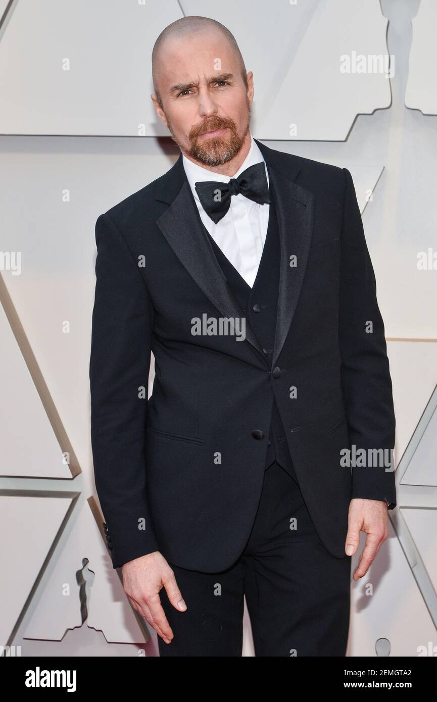Sam Rockwell walking on the 2019 Oscars red carpet at the 91st Academy ...