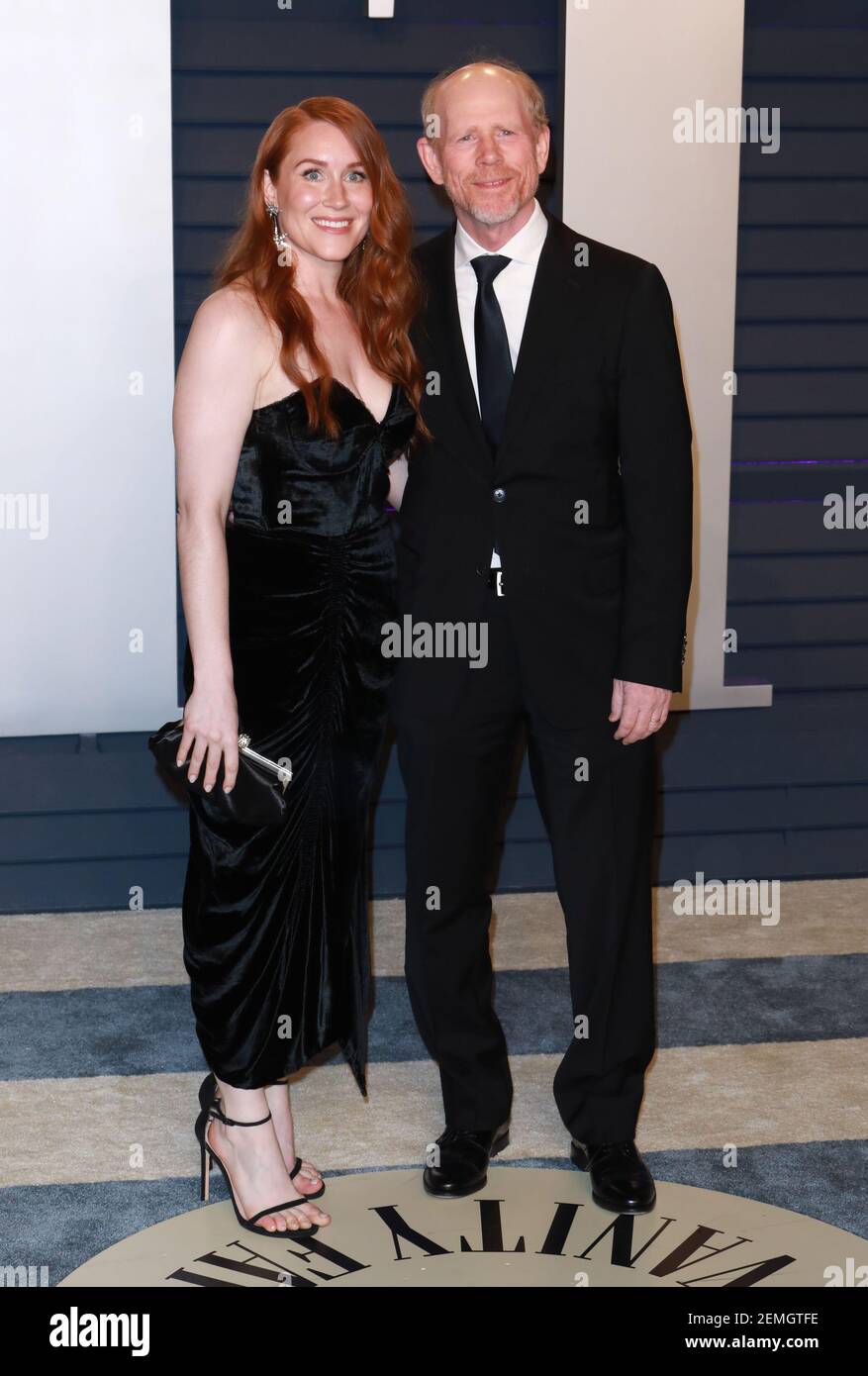 Paige Howard and Ron Howard walking on the red carpet at the 2019 ...