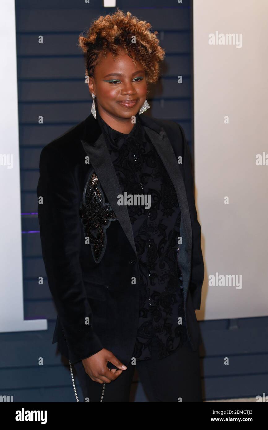Dee Rees walking on the red carpet at the 2019 Vanity Fair Oscar Party ...
