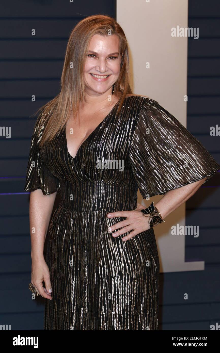 Krista Smith walking on the red carpet at the 2019 Vanity Fair Oscar ...