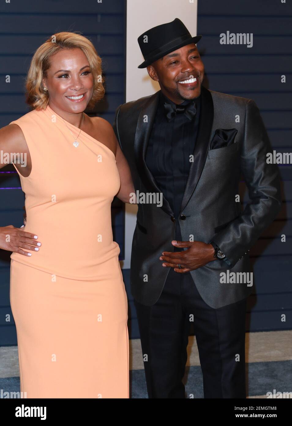 Heather Hayslett (L) and Will Packer walking on the red carpet at the ...