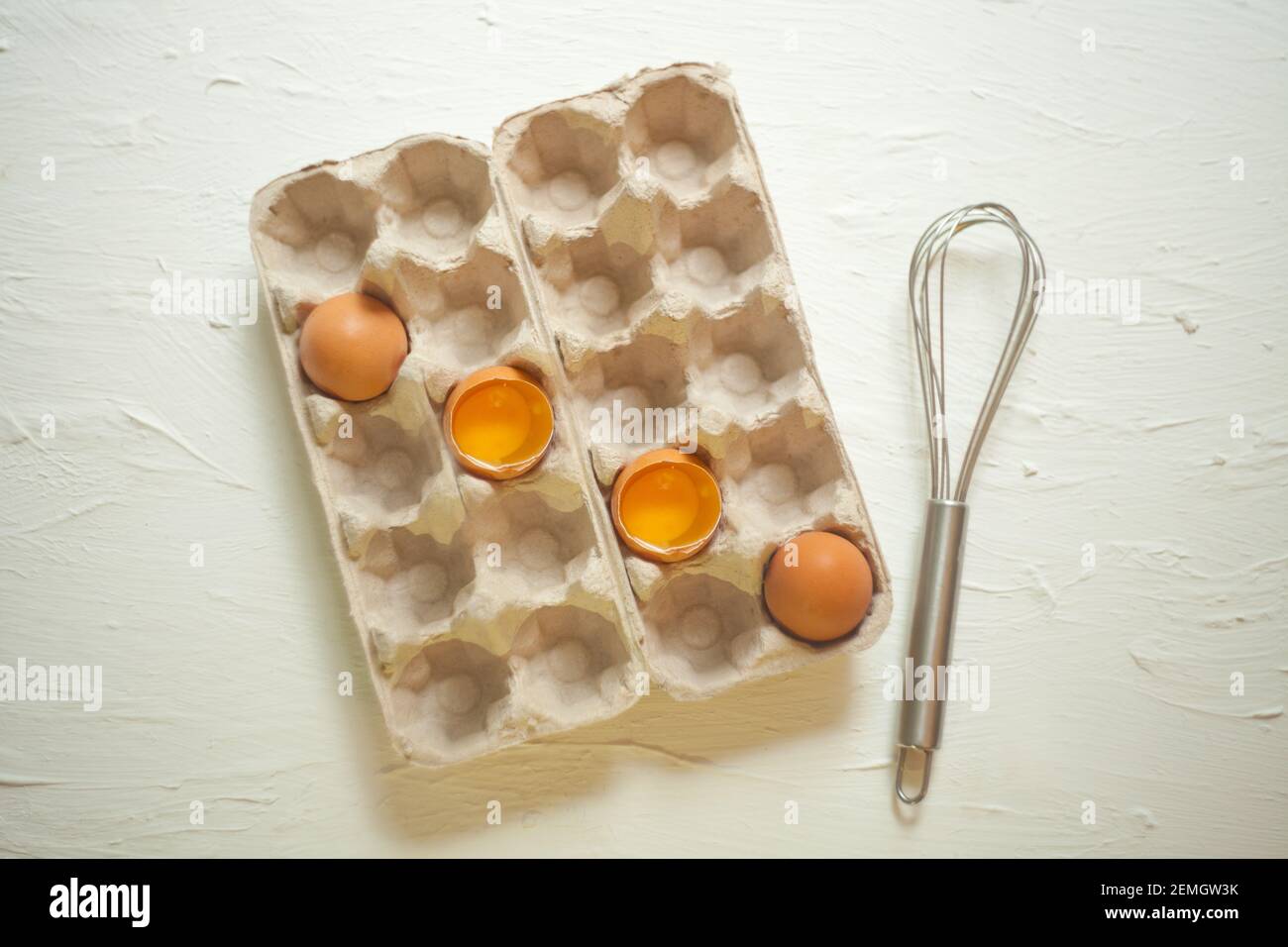 Eggs shell for omlette cooking. Yellow eggs for a cooking on a white ...