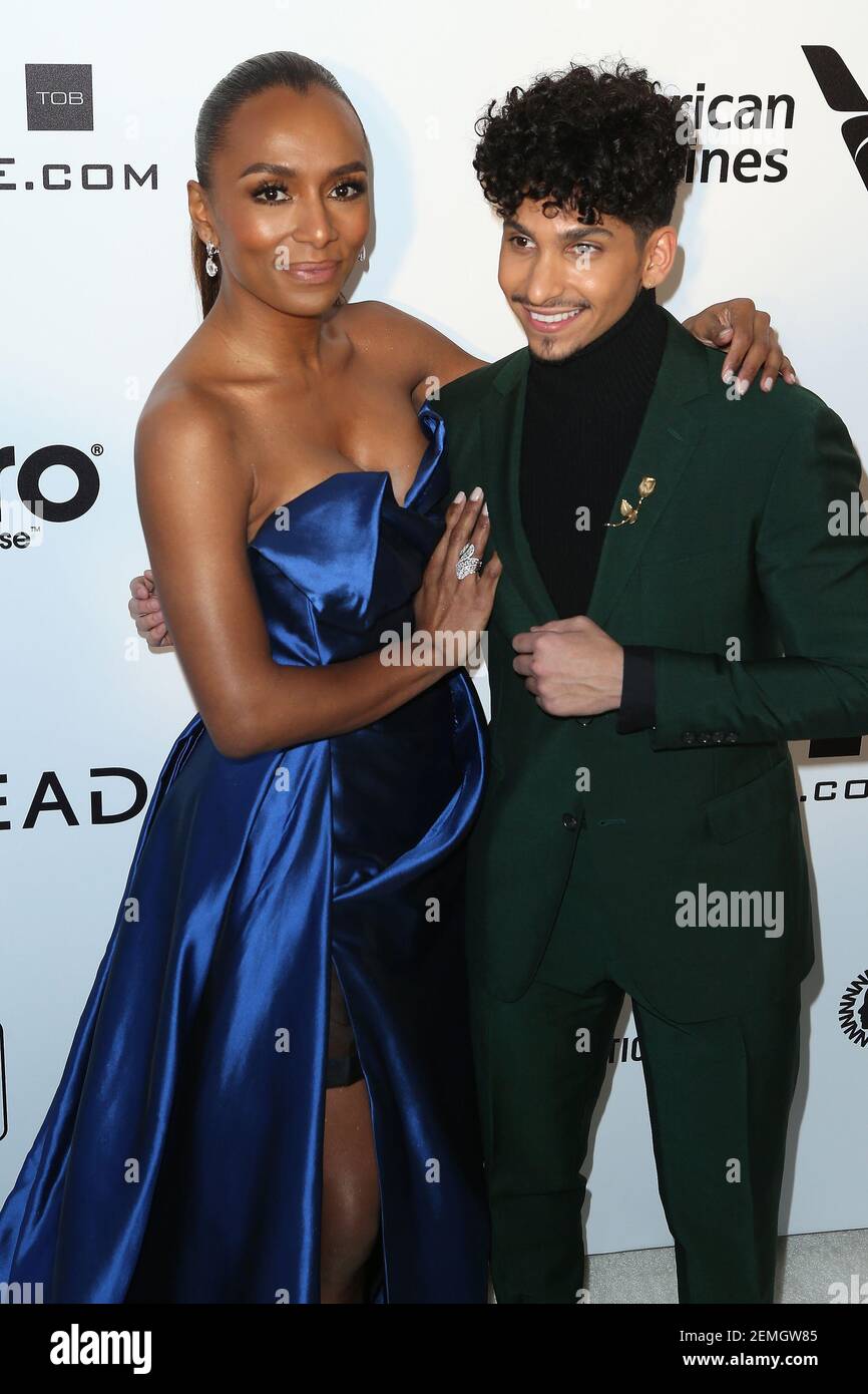 Janet Mock, Angel Bismarc Curiel attend the 27th Annual Elton John AIDS ...