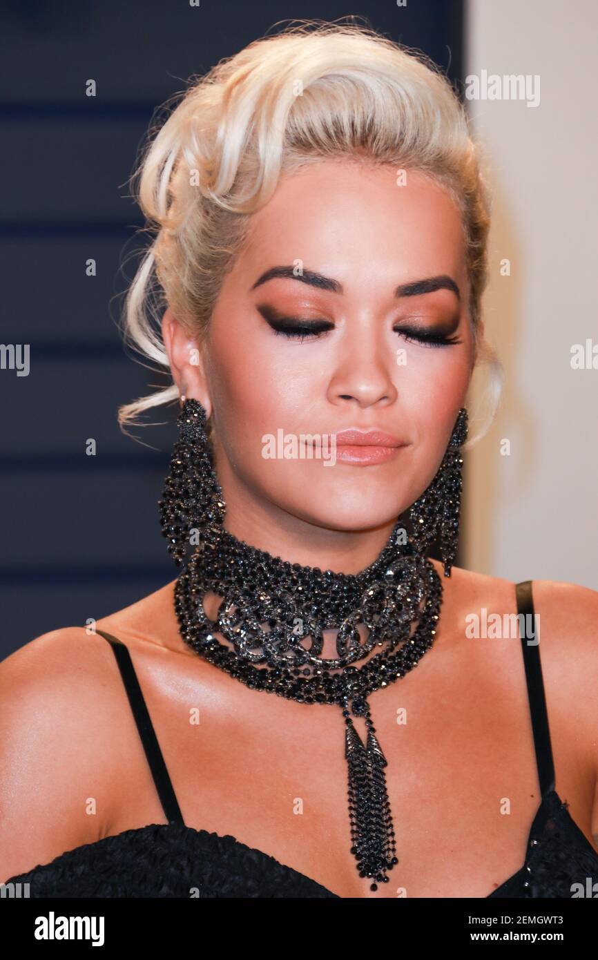 Rita Ora walking on the red carpet at the 2019 Vanity Fair Oscar Party ...