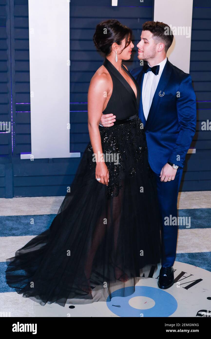 Priyanka Chopra and Nick Jonas walking on the red carpet at the 2019 ...