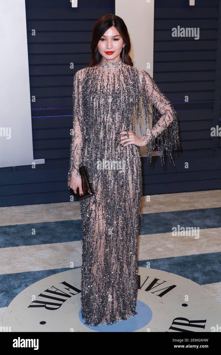 Gemma Chan walking on the red carpet at the 2019 Vanity Fair Oscar ...