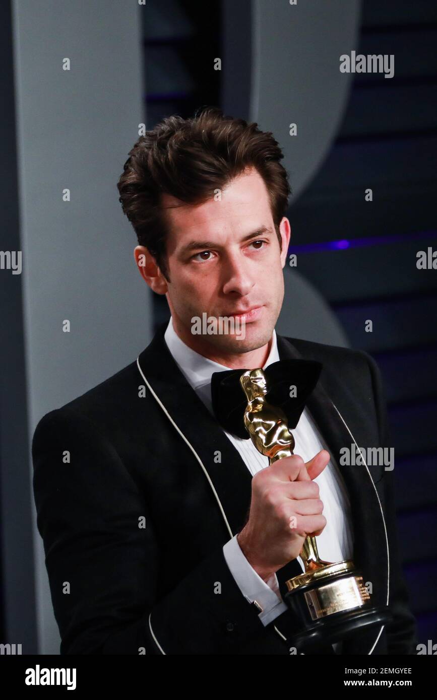 Mark Ronson walking on the red carpet at the 2019 Vanity Fair Oscar ...