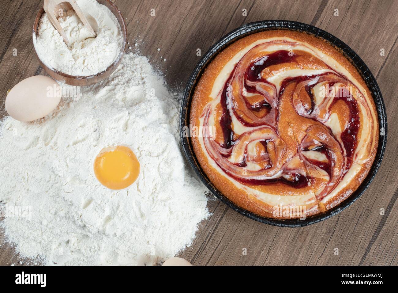 Soft yummy pie with ingredients aside Stock Photo - Alamy