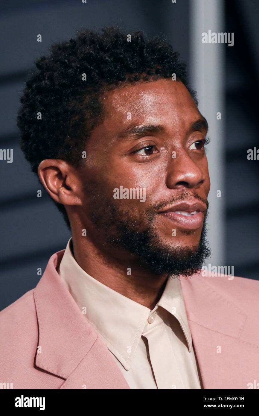 Chadwick Boseman walking on the red carpet at the 2019 Vanity Fair ...