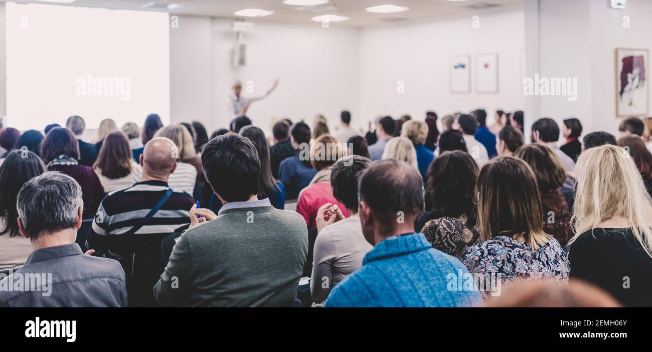 Woman giving interactive motivational speech at entrepreneurship ...