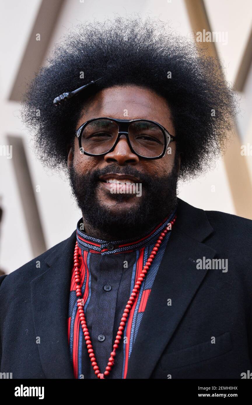 Questlove walking on the 2019 Oscars red carpet at the 91st Academy ...
