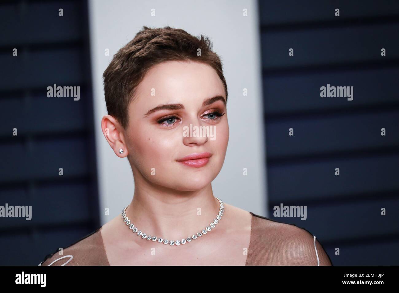 Joey King walking on the red carpet at the 2019 Vanity Fair Oscar Party ...