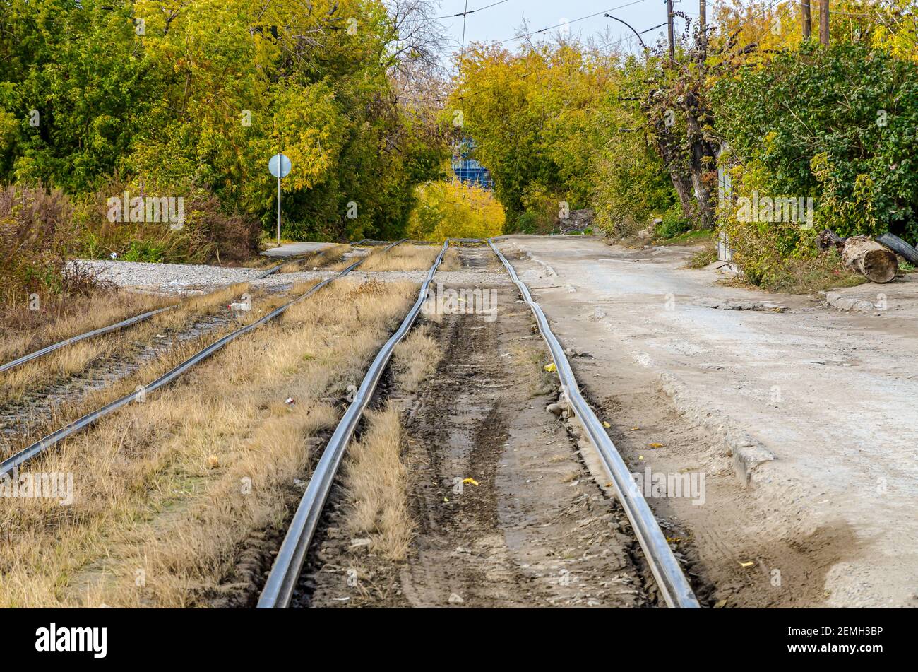 tram rails going along old city road Stock Photo - Alamy