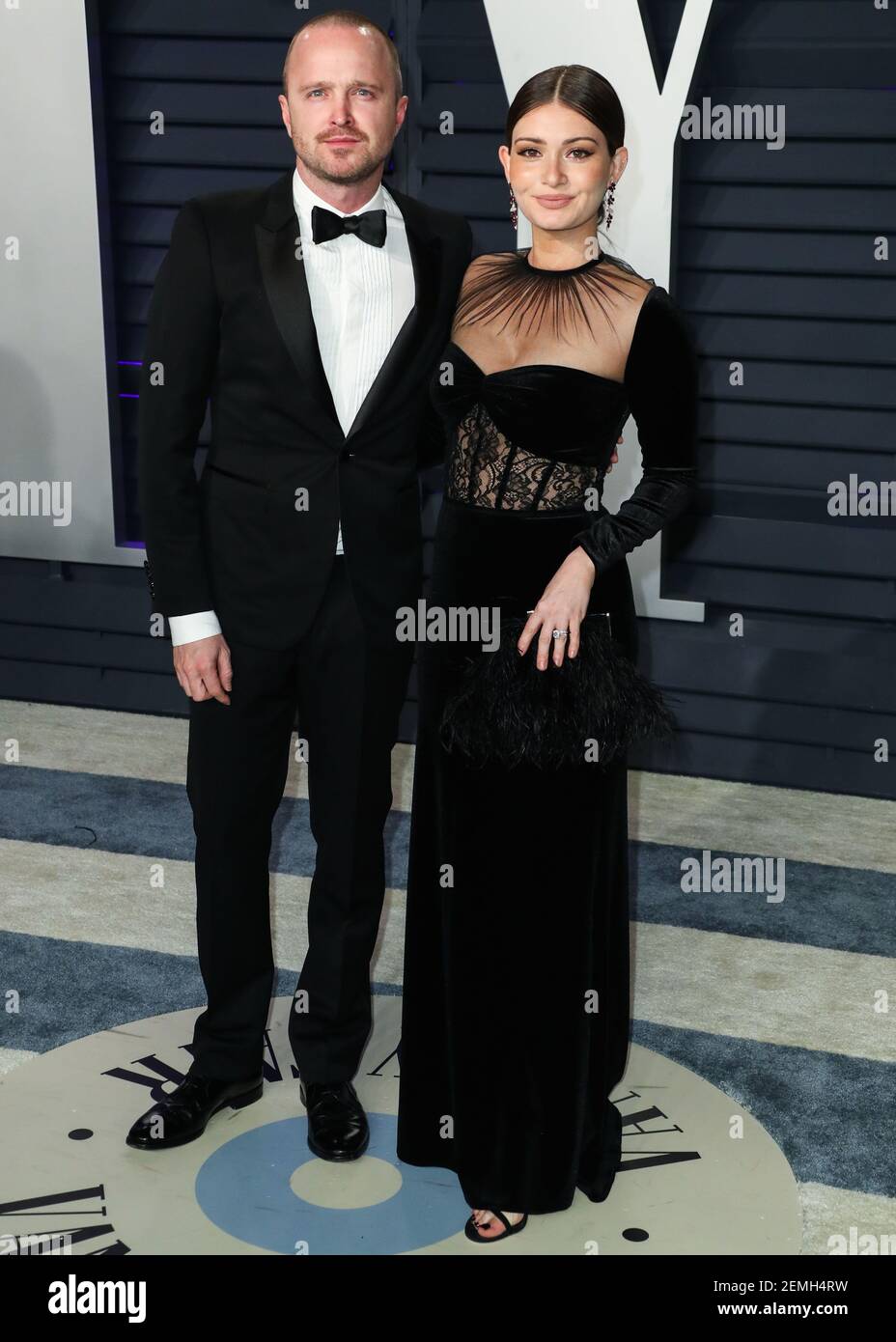 BEVERLY HILLS, LOS ANGELES, CA, USA - FEBRUARY 24: Aaron Paul and wife ...