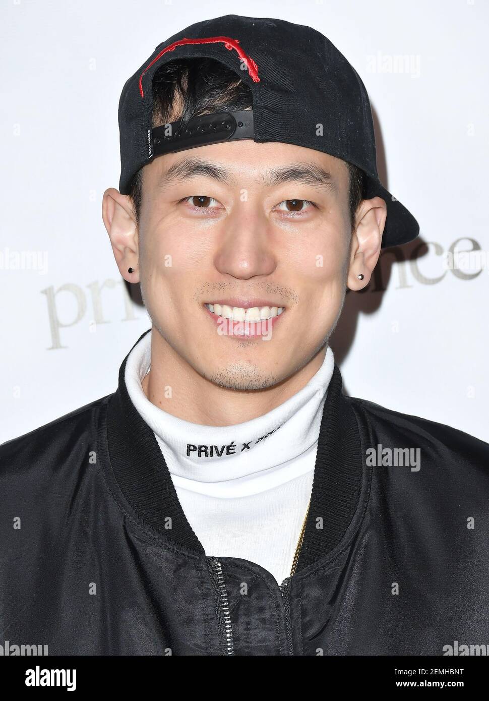 Jake Choi arrives at the Prive? Alliance Ready-To-Wear Fashion Presentation held at the Academy ...