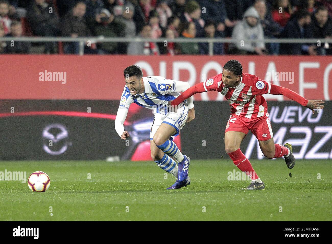 Girona CF's Douglas Luiz and Real Sociedad's Mikel Merino during La ...
