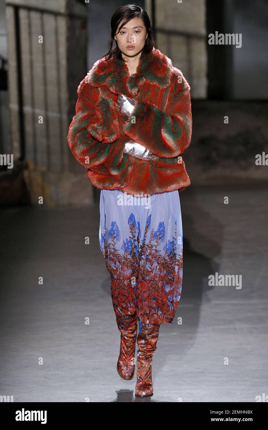 Model Chu Wong walks on the runway during the Dries Van Noten Ready To ...