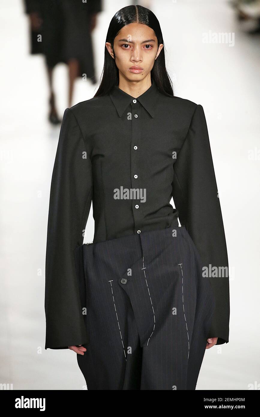 Model Noah Carlos walks on the runway during the Maison Margiela Ready ...