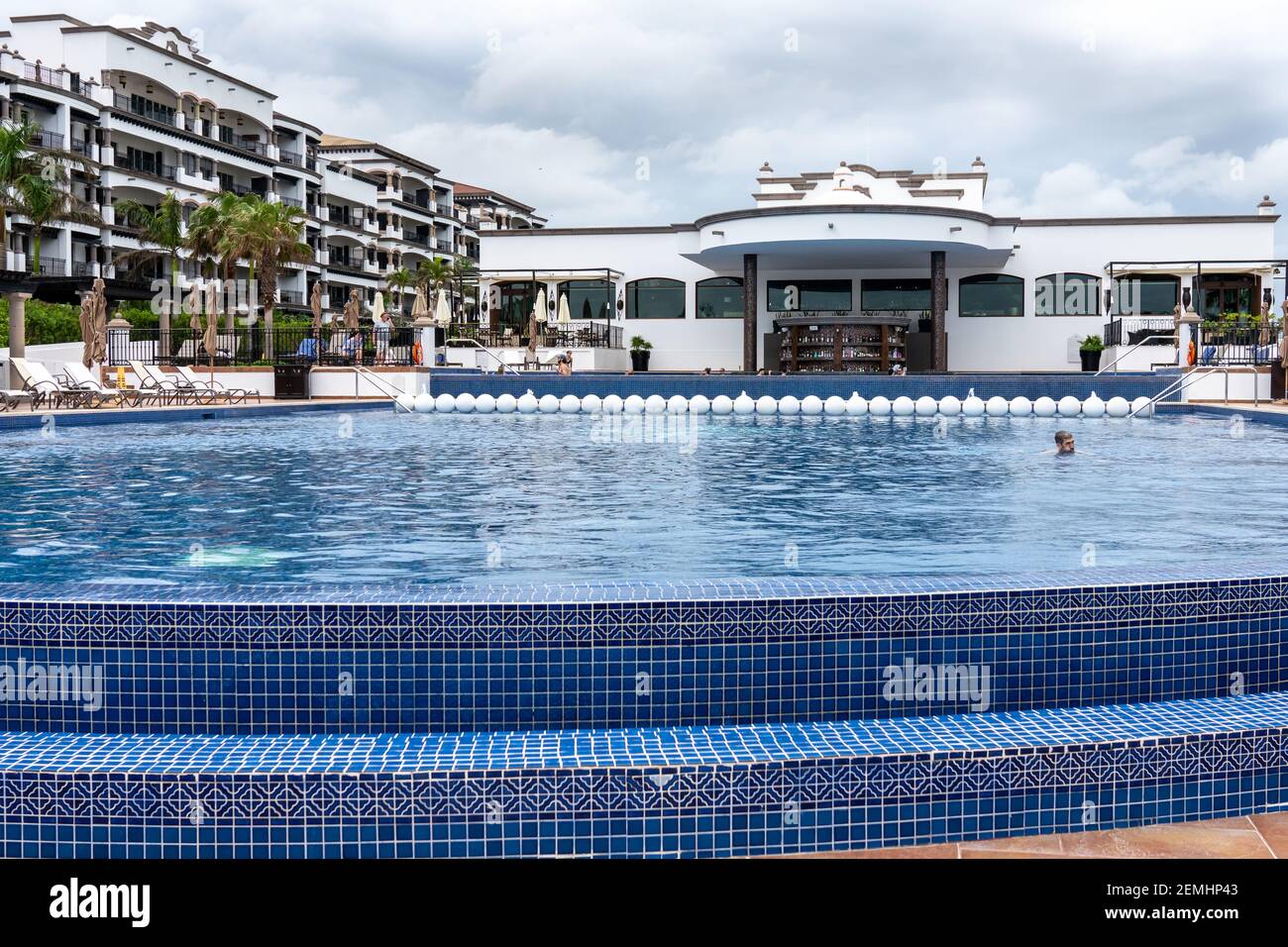 Two-tier ocean-front infinity pool at Grand Residences Riviera Cancun ...