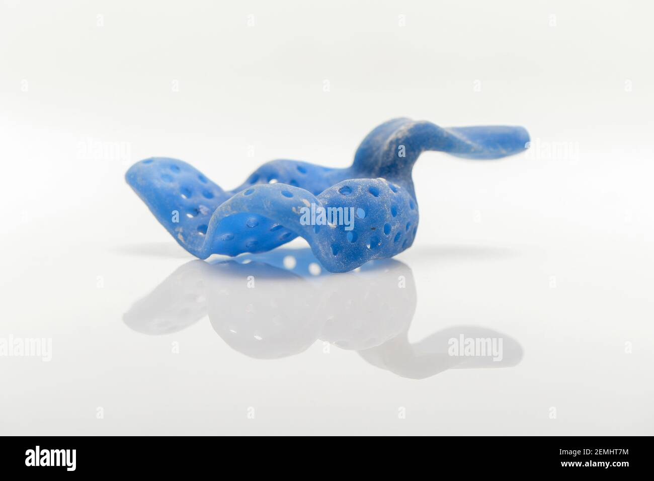 A dental tray used by a dentist to make impressions of teeth filling it ...