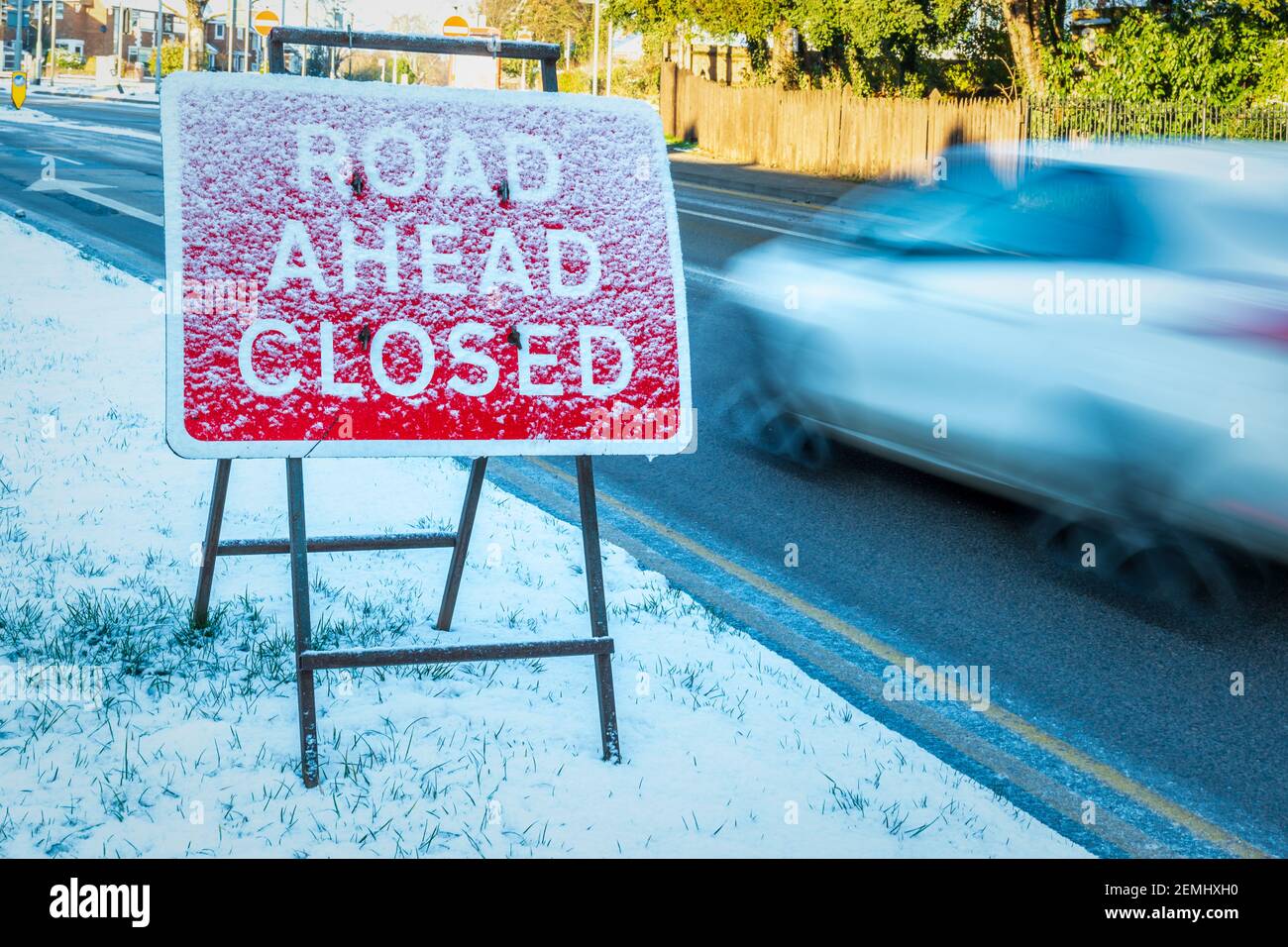 Road ahead closed road warning sign under winter snow in england uk ...