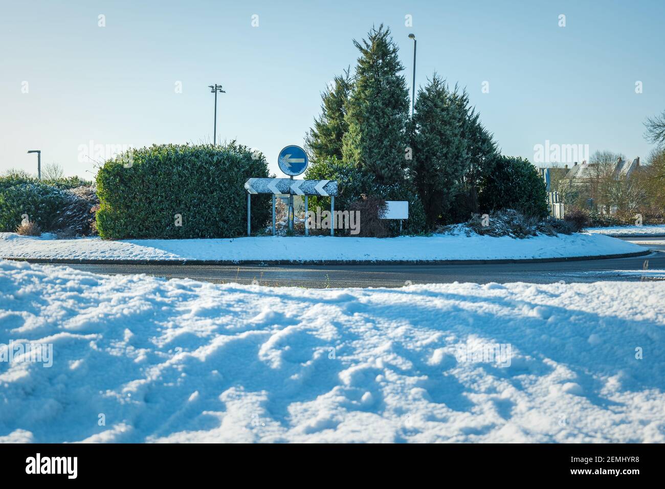British roundabout under winter snow in england uk Stock Photo - Alamy