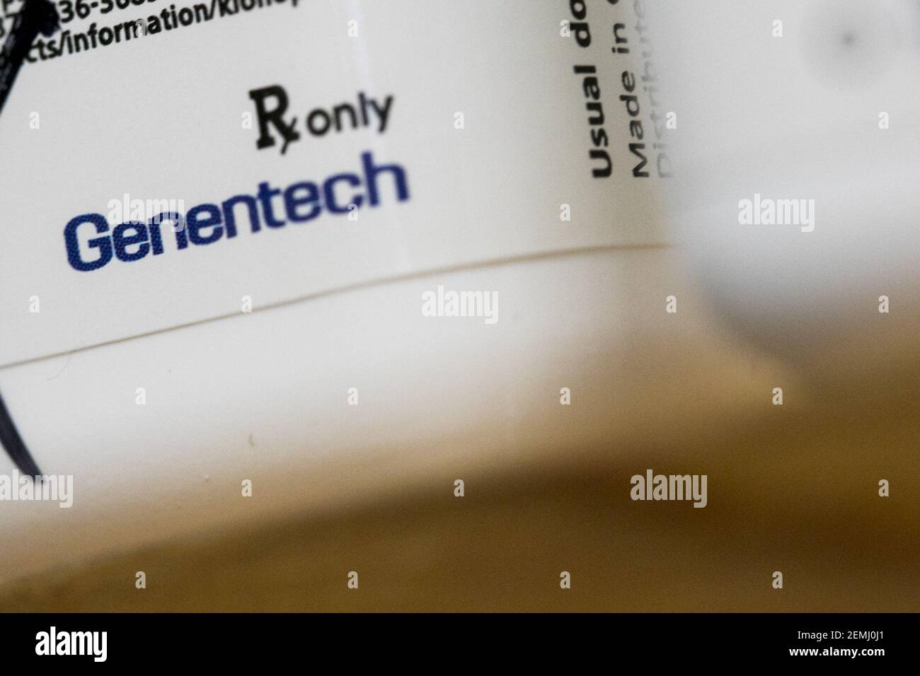 A Genentech logo is seen on prescription pharmaceutical packaging ...