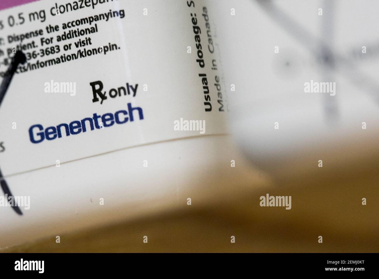 A Genentech logo is seen on prescription pharmaceutical packaging ...