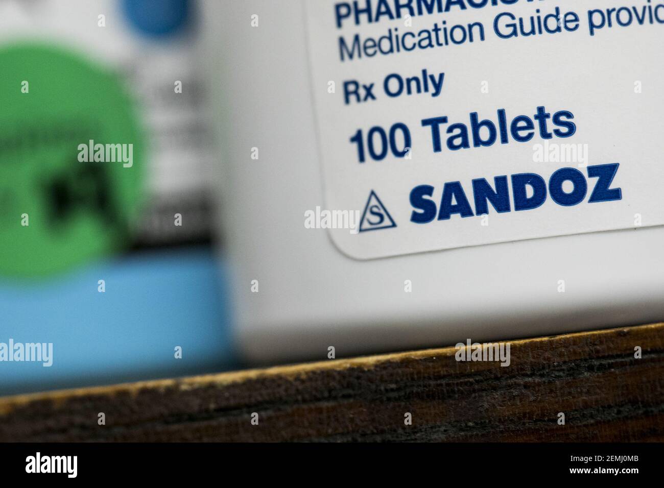 A Sandoz logo is seen on prescription pharmaceutical packaging ...