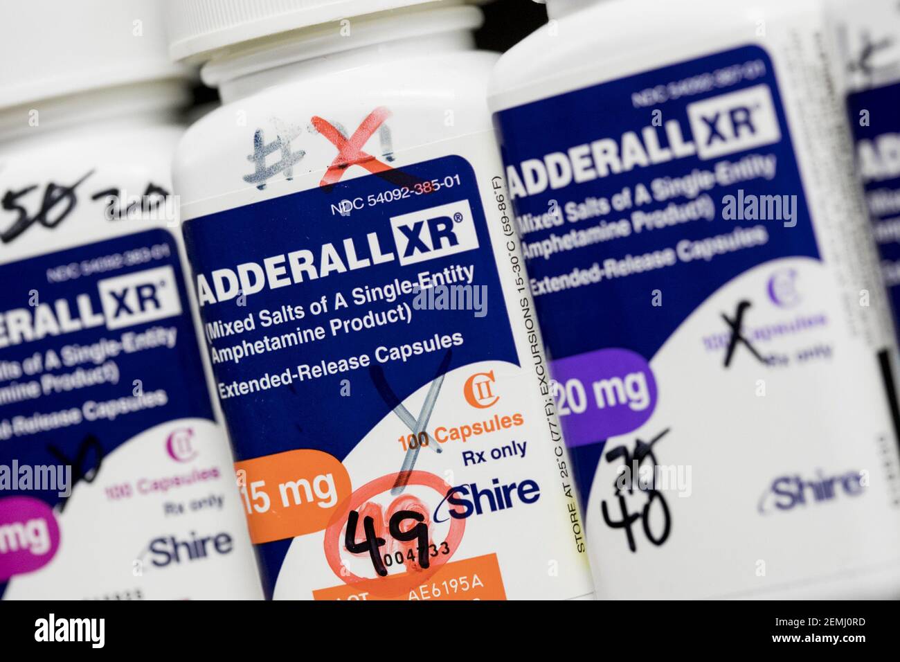 Bottles of Adderall XR prescription pharmaceuticals photographed in a ...