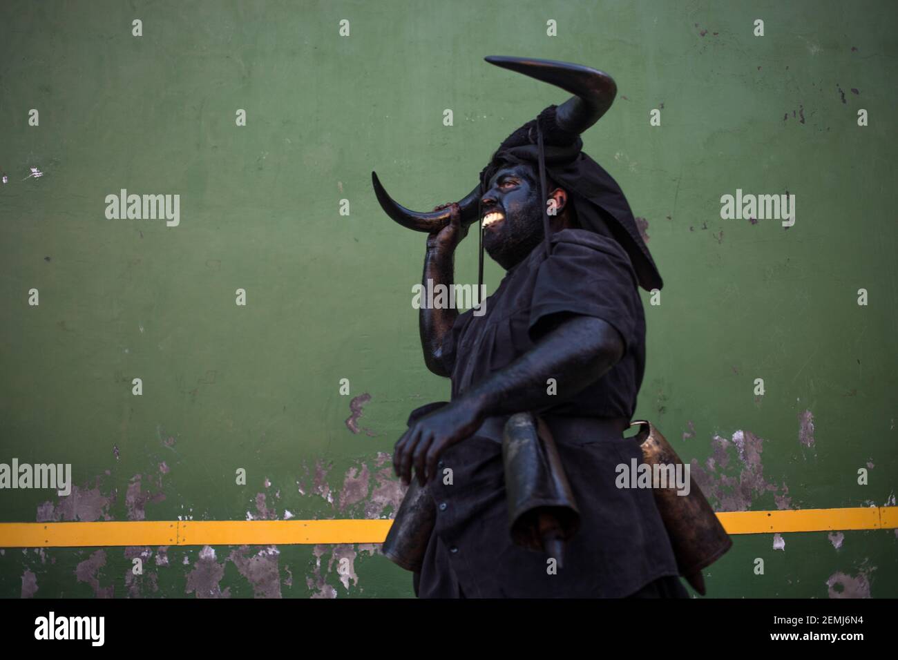 A man is seen dress like a Devil during the Devils of Luzon Carnival ...