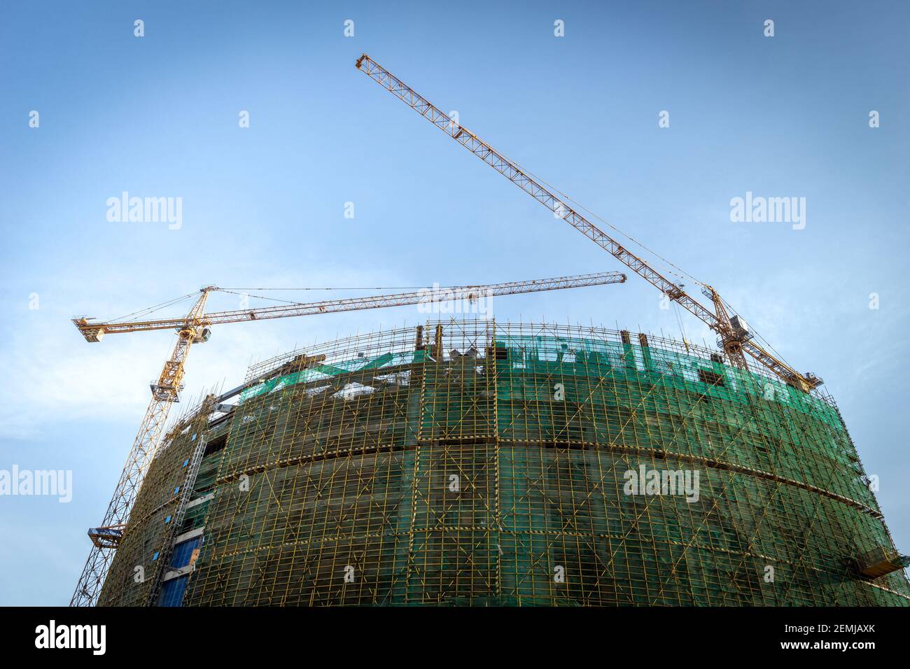 Building construction site, tall skyscrapers and cranes Stock Photo - Alamy